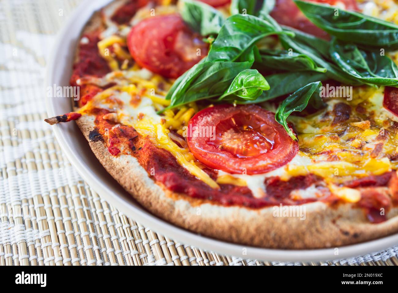 plant-based margherita pizza with fresh tomatoes and basil, healthy ...