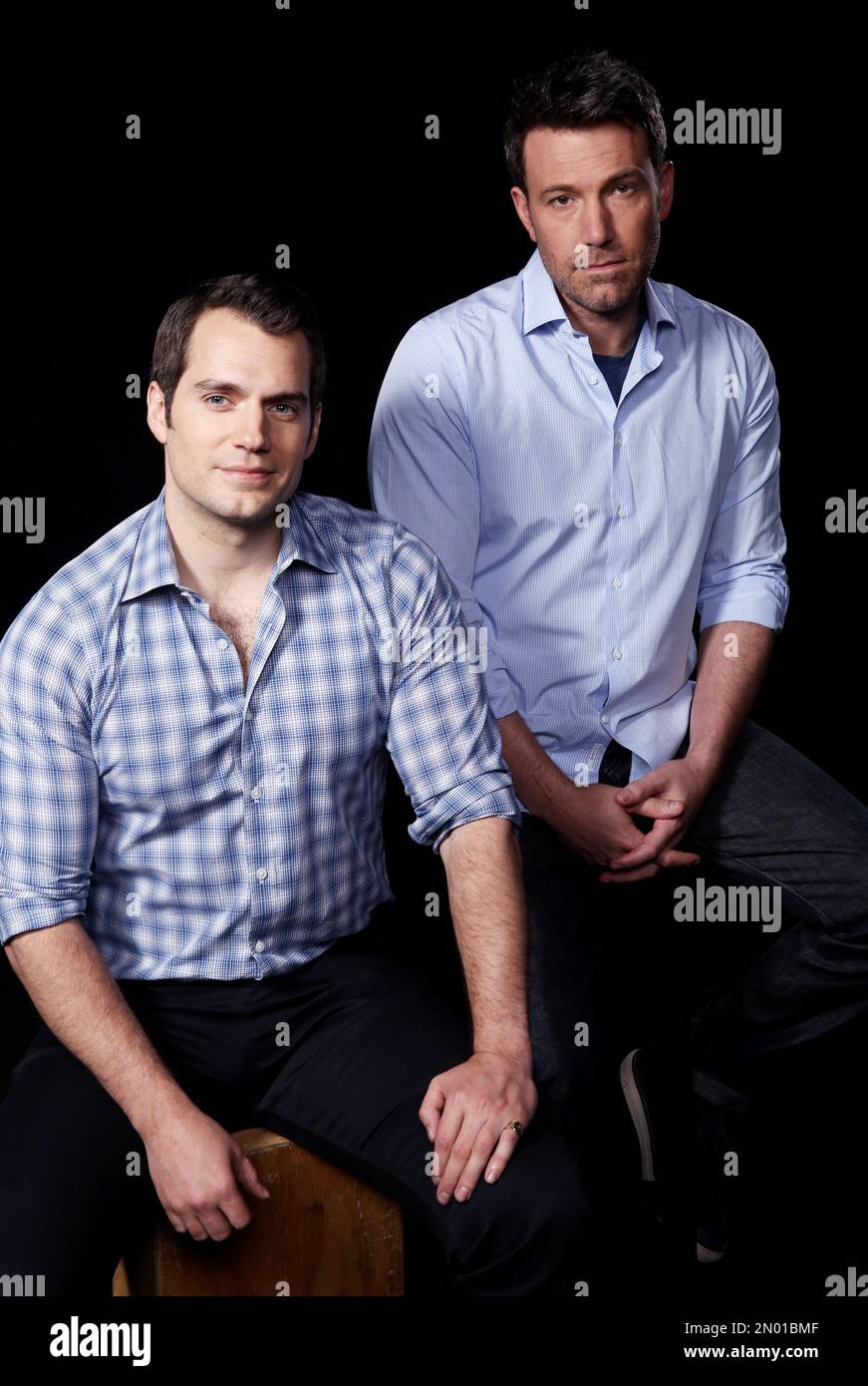 In this March 18, 2016 photo, Henry Cavill, left, and Ben Affleck pose ...