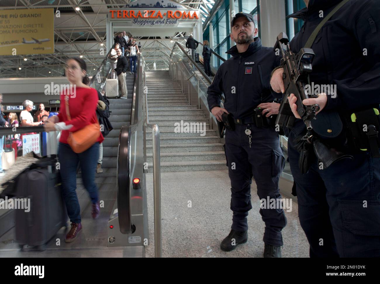 Italian police patrol Leonardo Da Vinci airport in Fiumicino, near Rome ...