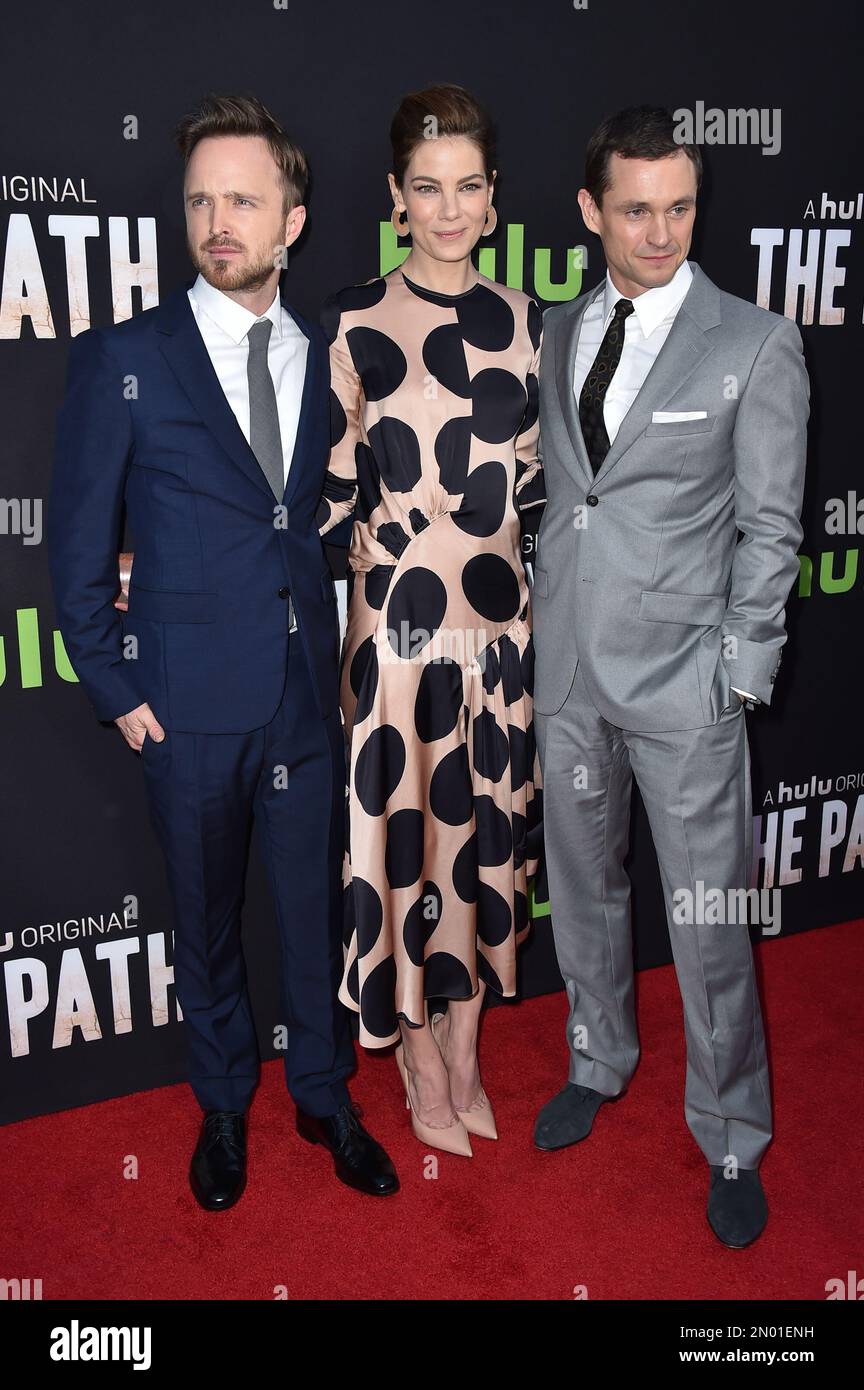 Michelle Monaghan, Aaron Paul and Hugh Dancy arrive at the premiere of ...
