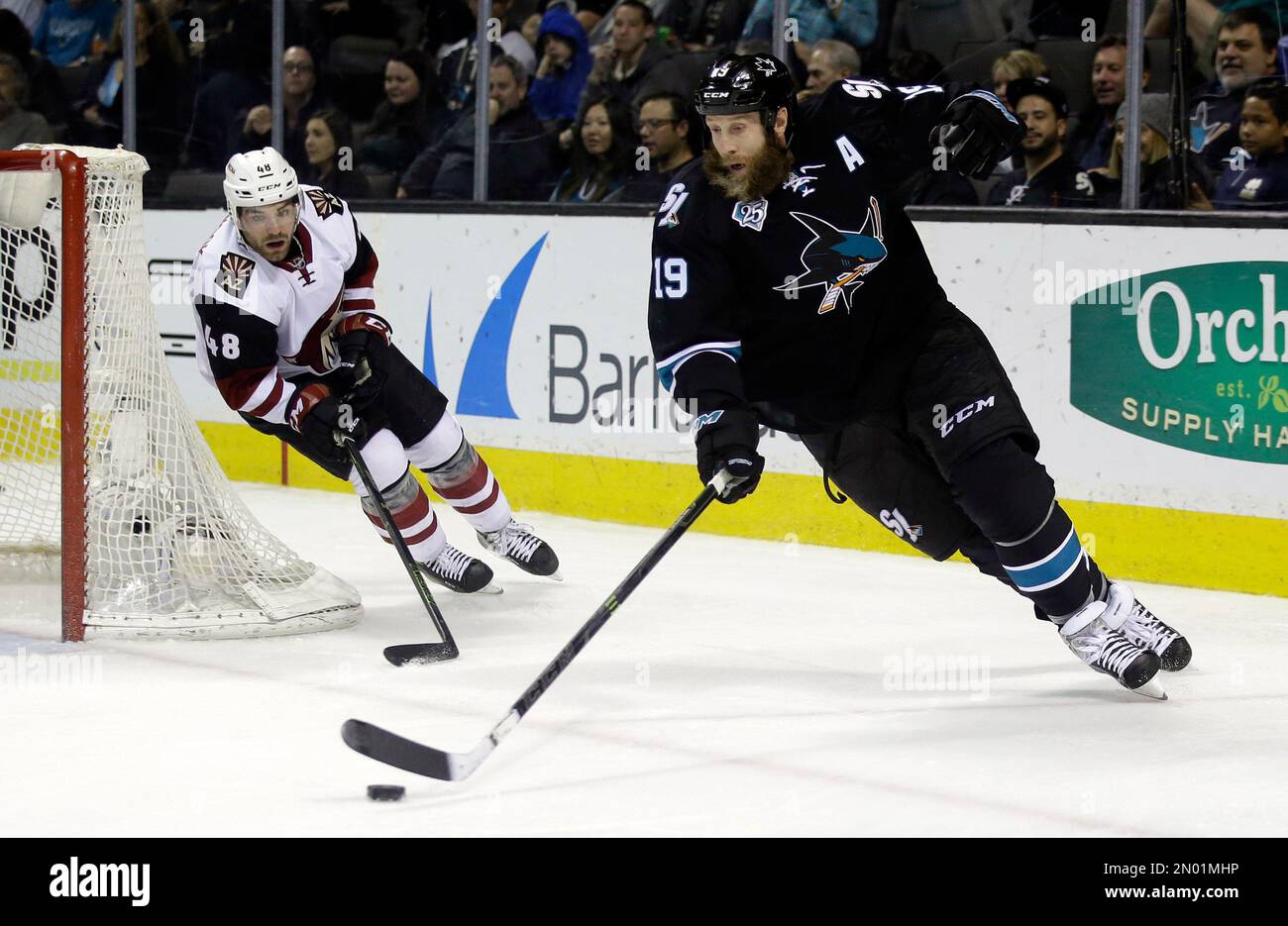 San Jose Sharks' Joe Thornton (19) skates past Arizona Coyotes' Jordan ...