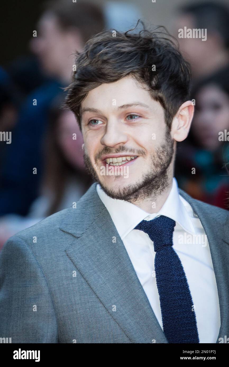 Iwan Rheon poses for photographers upon arrival at the Empire Film ...