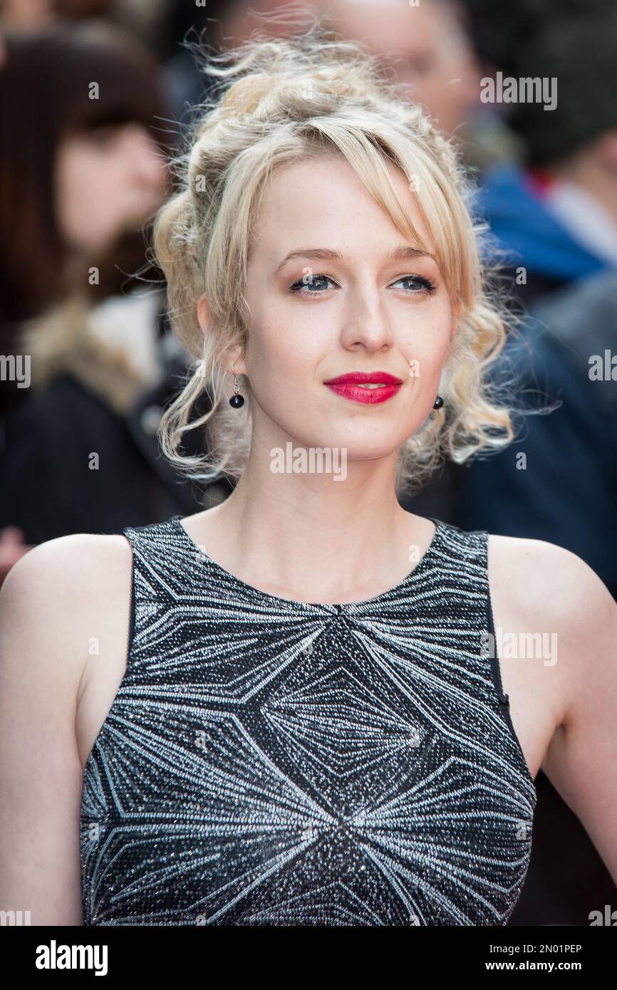 Holli Dempsey poses for photographers upon arrival at the Empire Film ...