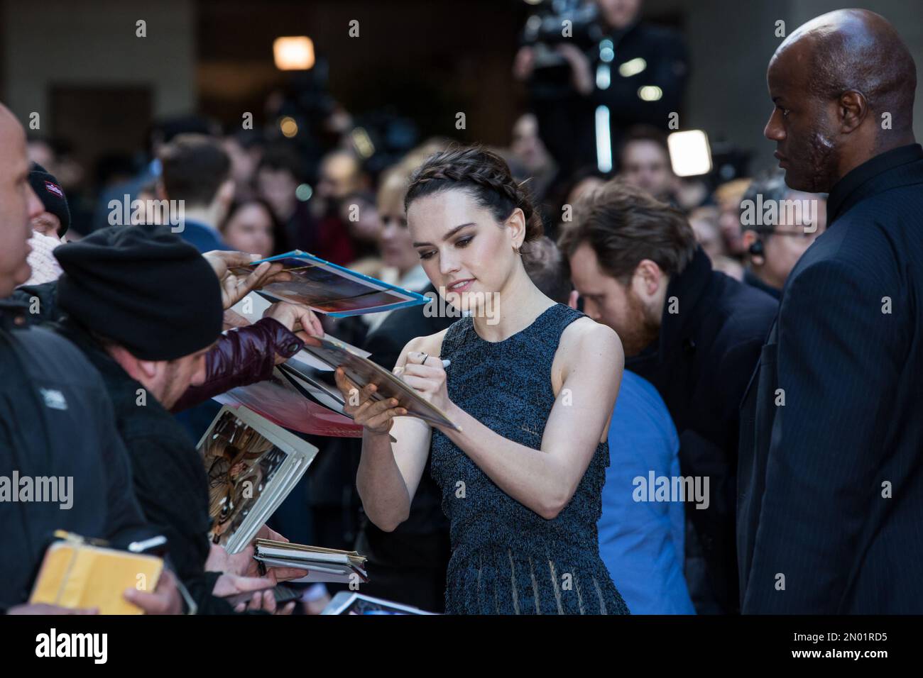 Actress Daisy Ridley signs autographs upon arrival at the Empire Film ...
