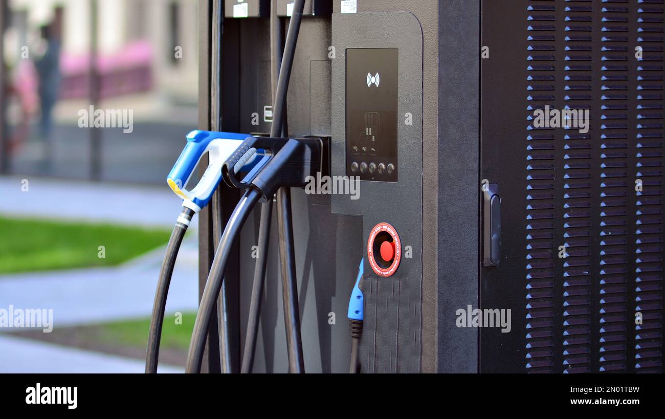 Electric car charging station. Transport plug and fuel recharge. Future ...