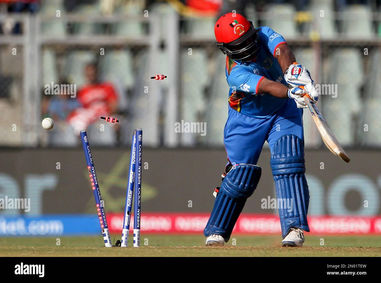 Afghanistan’s Mohammad Shahzad is bowled out by South Africa's Chris ...