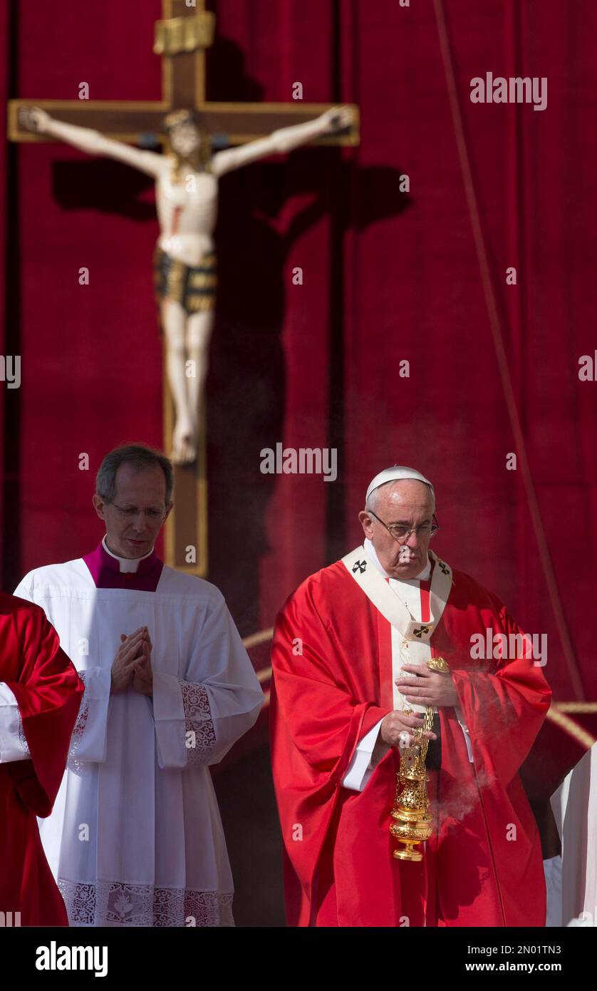 Pope Francis spreads incense as he celebrates Palm Sunday Mass, in St ...
