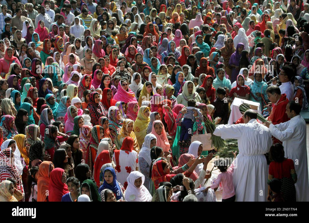 Pakistani Christians pray during Palm Sunday Mass in St. Anthony Church ...