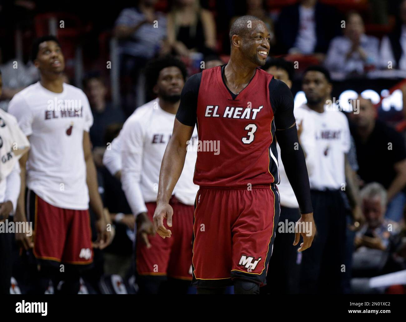 Miami Heat guard Dwyane Wade (3) smiles after being acknowledged for ...