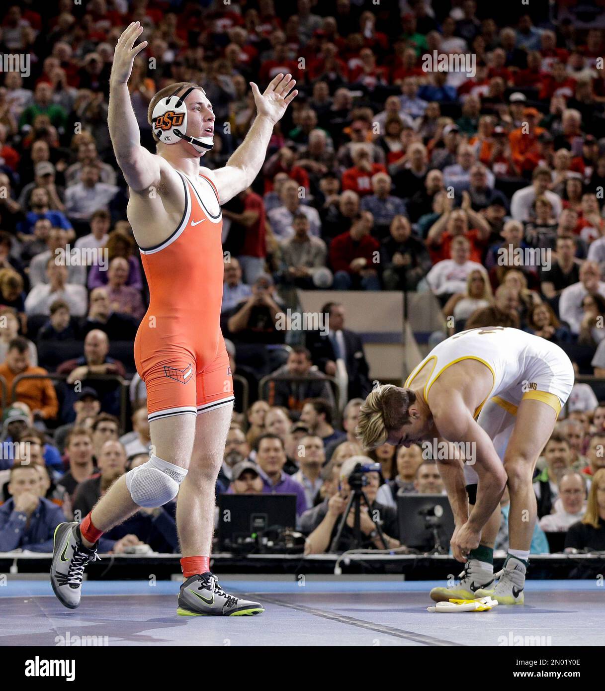 Oklahoma State's Dean Heil, left, reacts after defeating Wyoming's ...