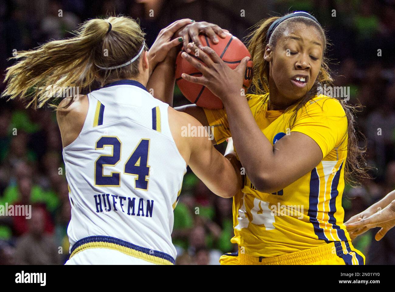 North Carolina A&T’s Aprill McRae (14) competes for a rebound with ...