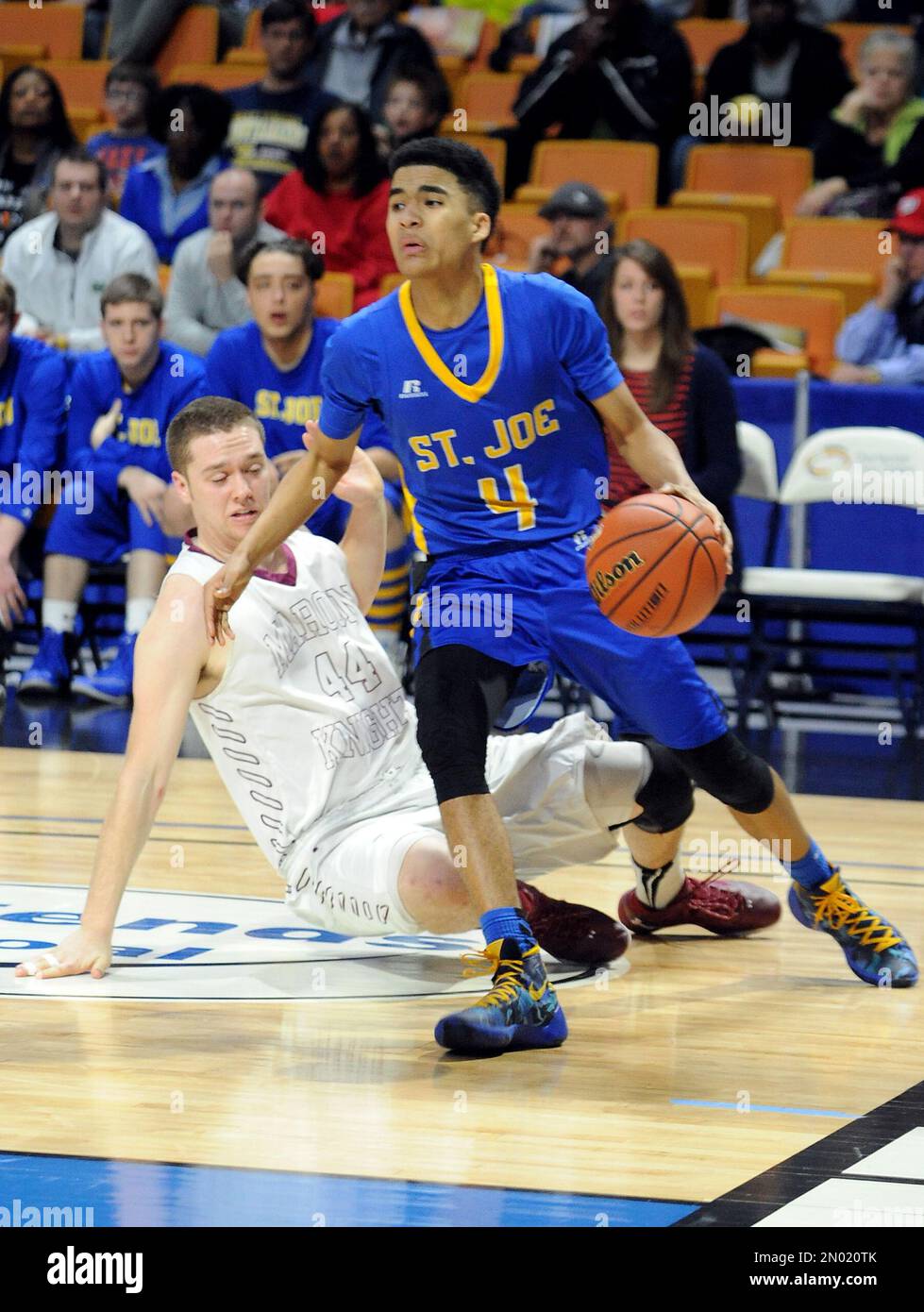 St. Joseph Central Deaundra Murphy (4) drives ball against Wheeling ...