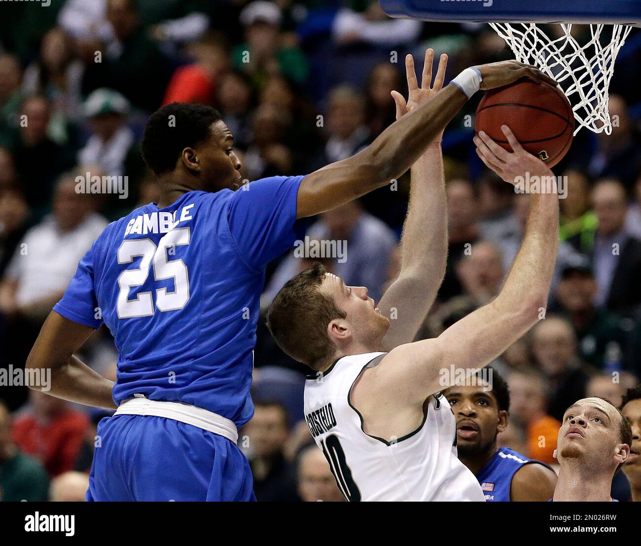 Middle Tennessee's Karl Gamble (25) blocks a shot by Michigan State's ...