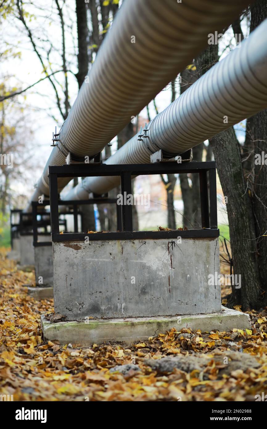 Metal pipes on the street. pipes from the pipeline. gas pipeline for ...