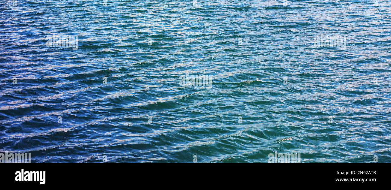 Water surface. The texture of the water. Waves on the lake windy ...