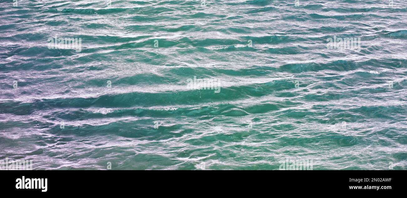 Water surface. The texture of the water. Waves on the lake windy ...
