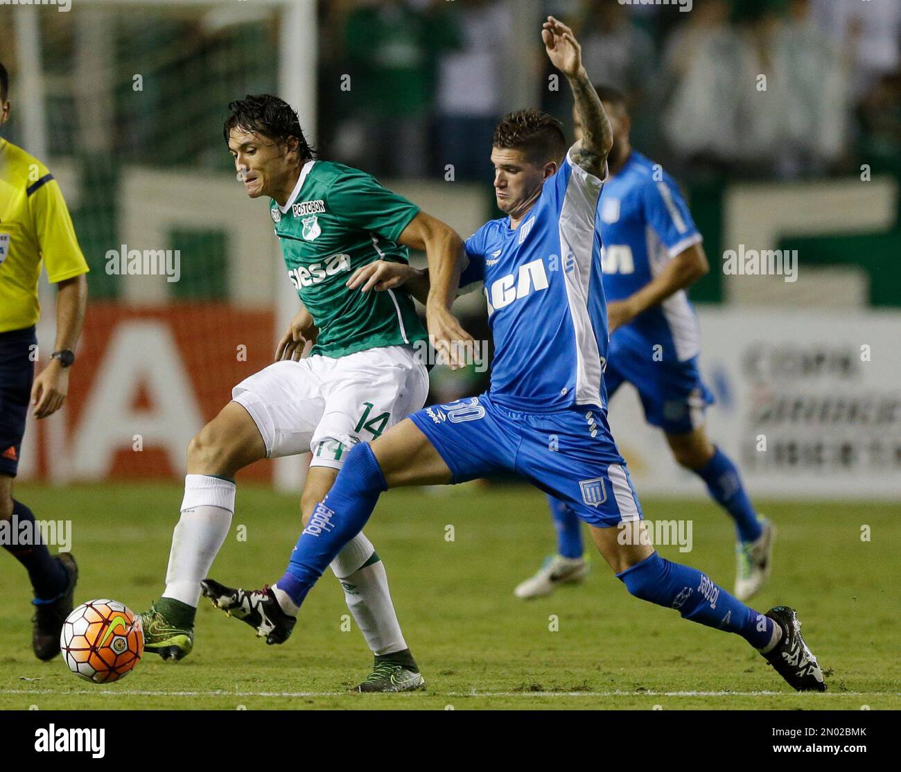 Rodrigo De Paul of Argentina's Racing Club, right, and John Lozano of ...