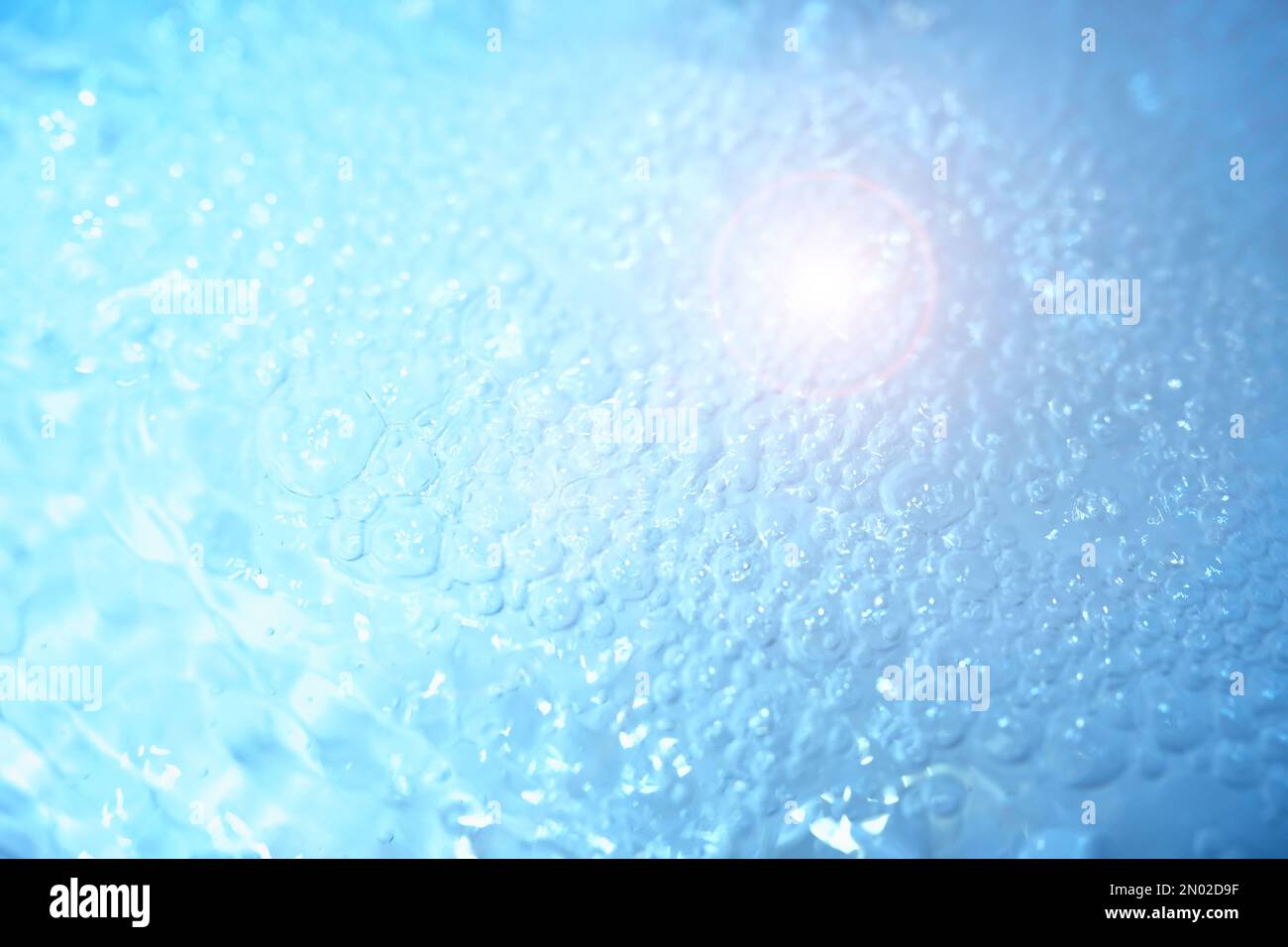 Blue water texture. Bubbles bubbling water Stock Photo - Alamy