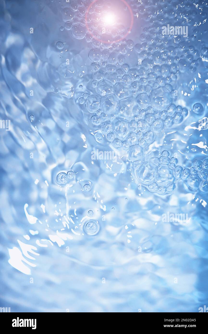 Blue water texture. Bubbles bubbling water Stock Photo - Alamy