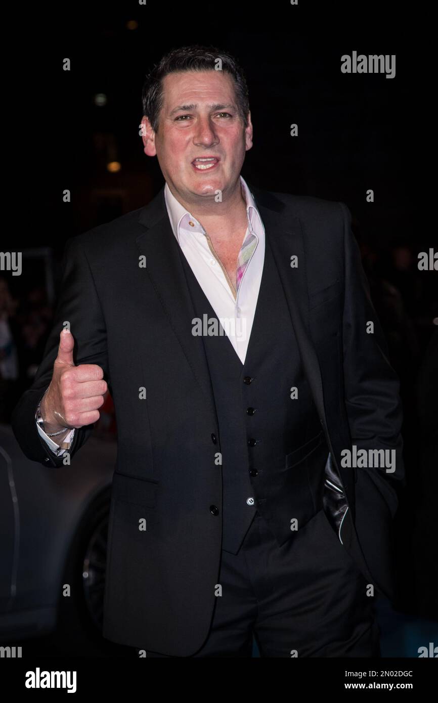 Musician Tony Hadley poses for photographers upon arrival at the ...