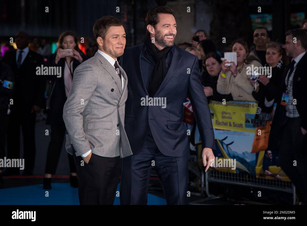 Actors Taron Egerton, left and Hugh Jackman pose for photographers upon ...