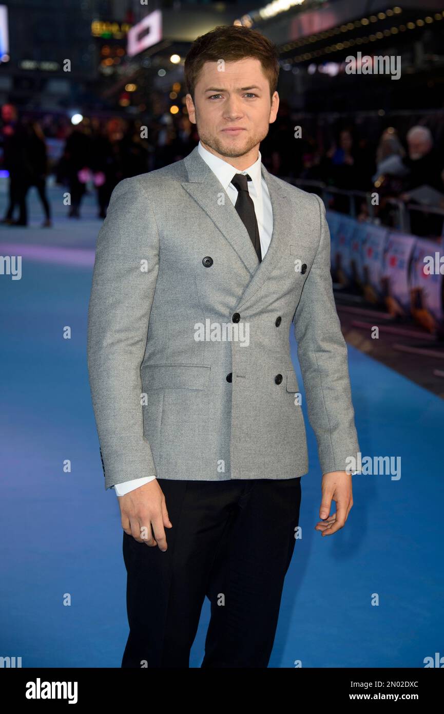 Taron Egerton poses for photographers upon arrival at the premiere of ...