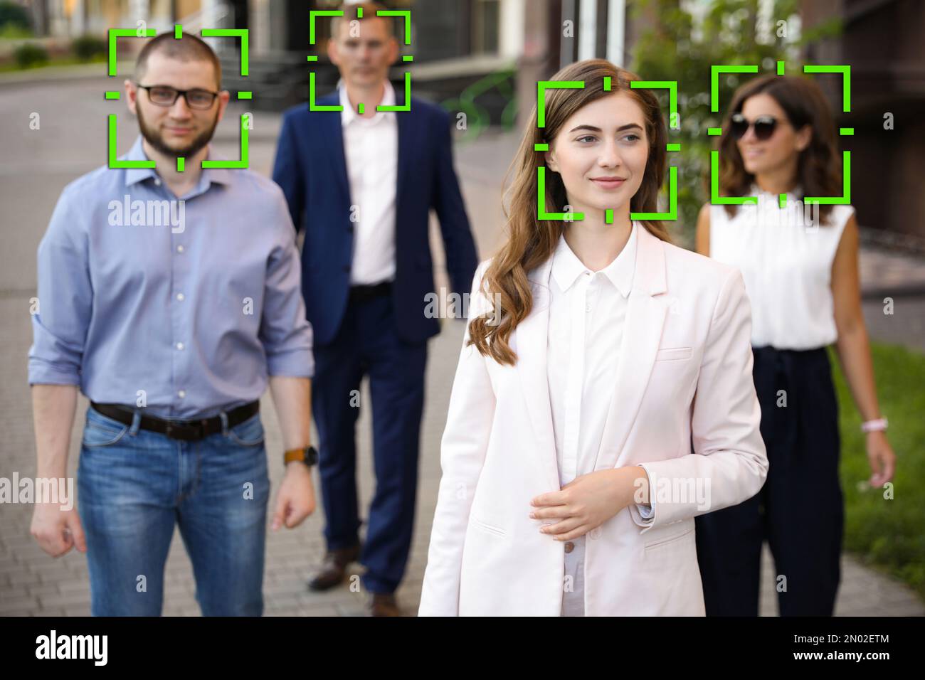 Facial recognition system identifying people on city street Stock Photo ...