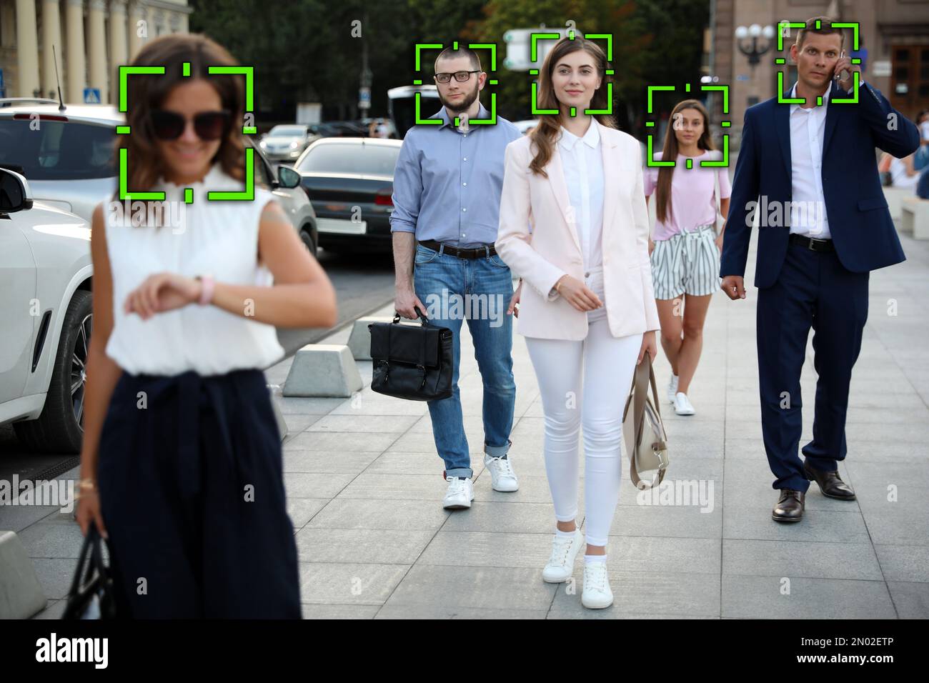 Facial recognition system identifying people on city street Stock Photo ...