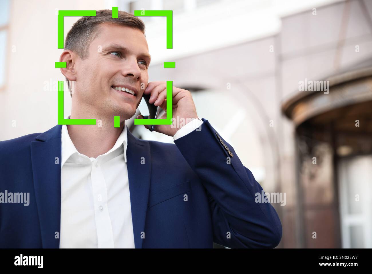 Facial recognition system identifying man on city street Stock Photo ...