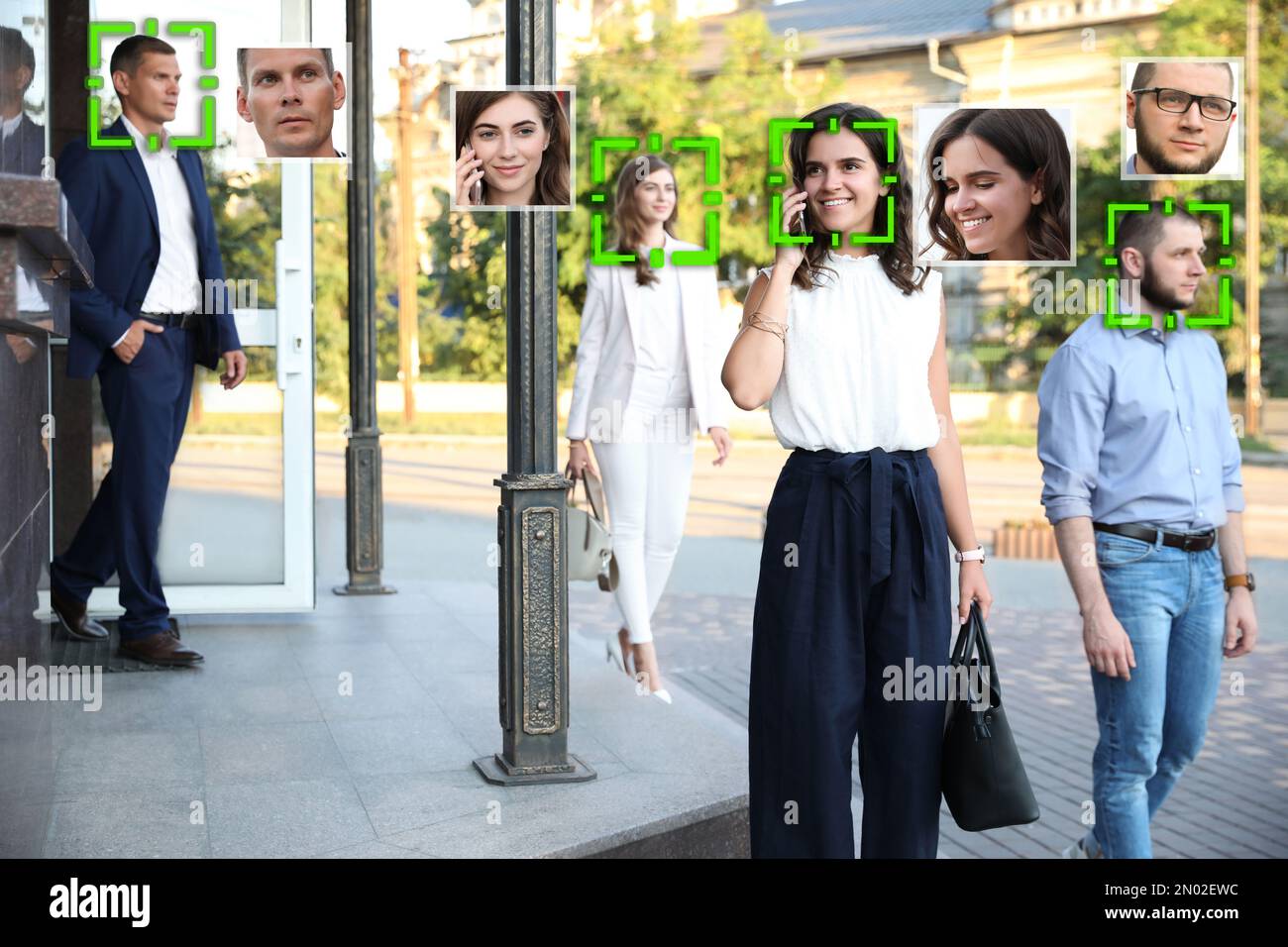 Facial recognition system identifying people on city street Stock Photo ...