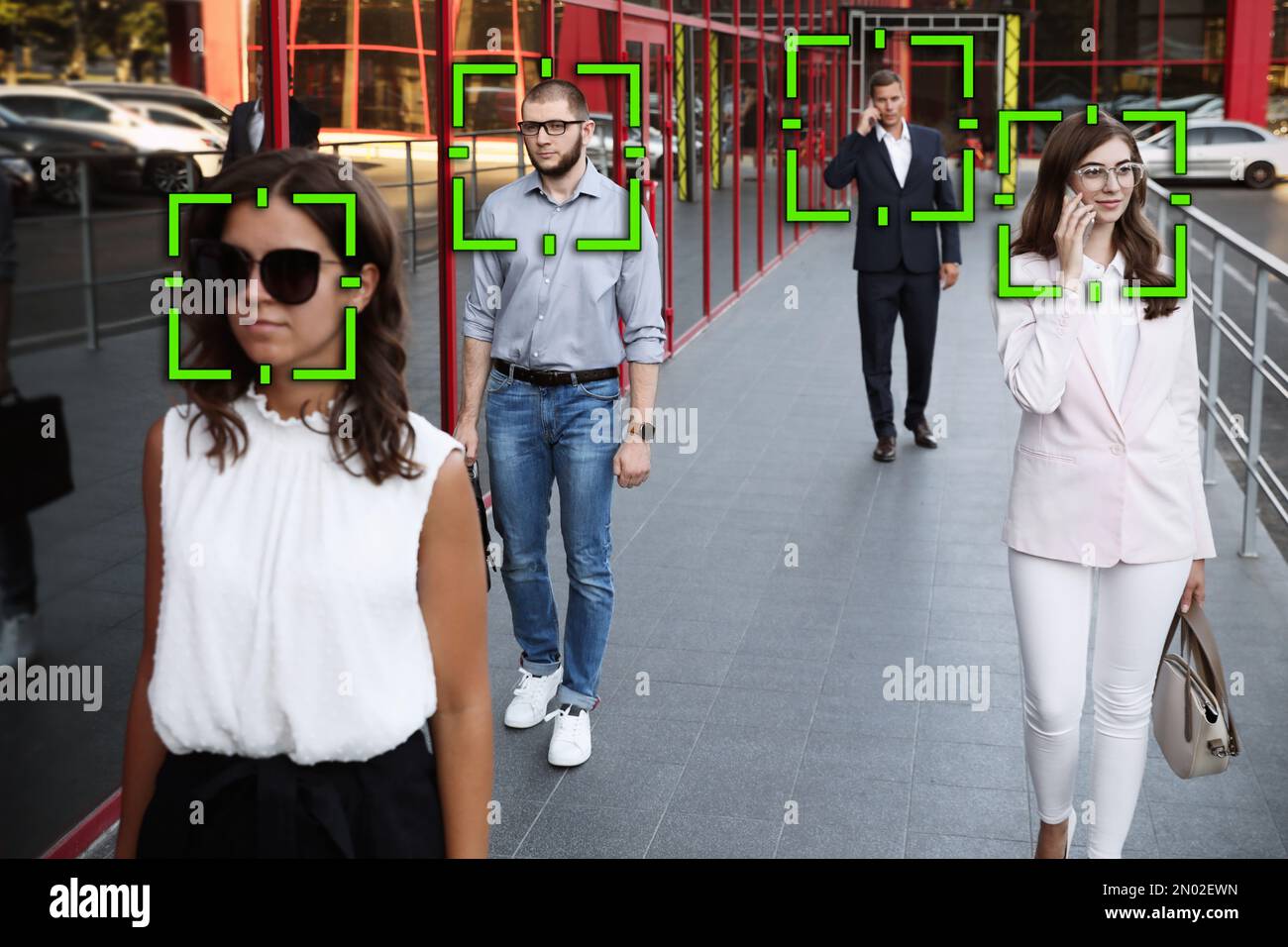Facial recognition system identifying people on city street Stock Photo ...