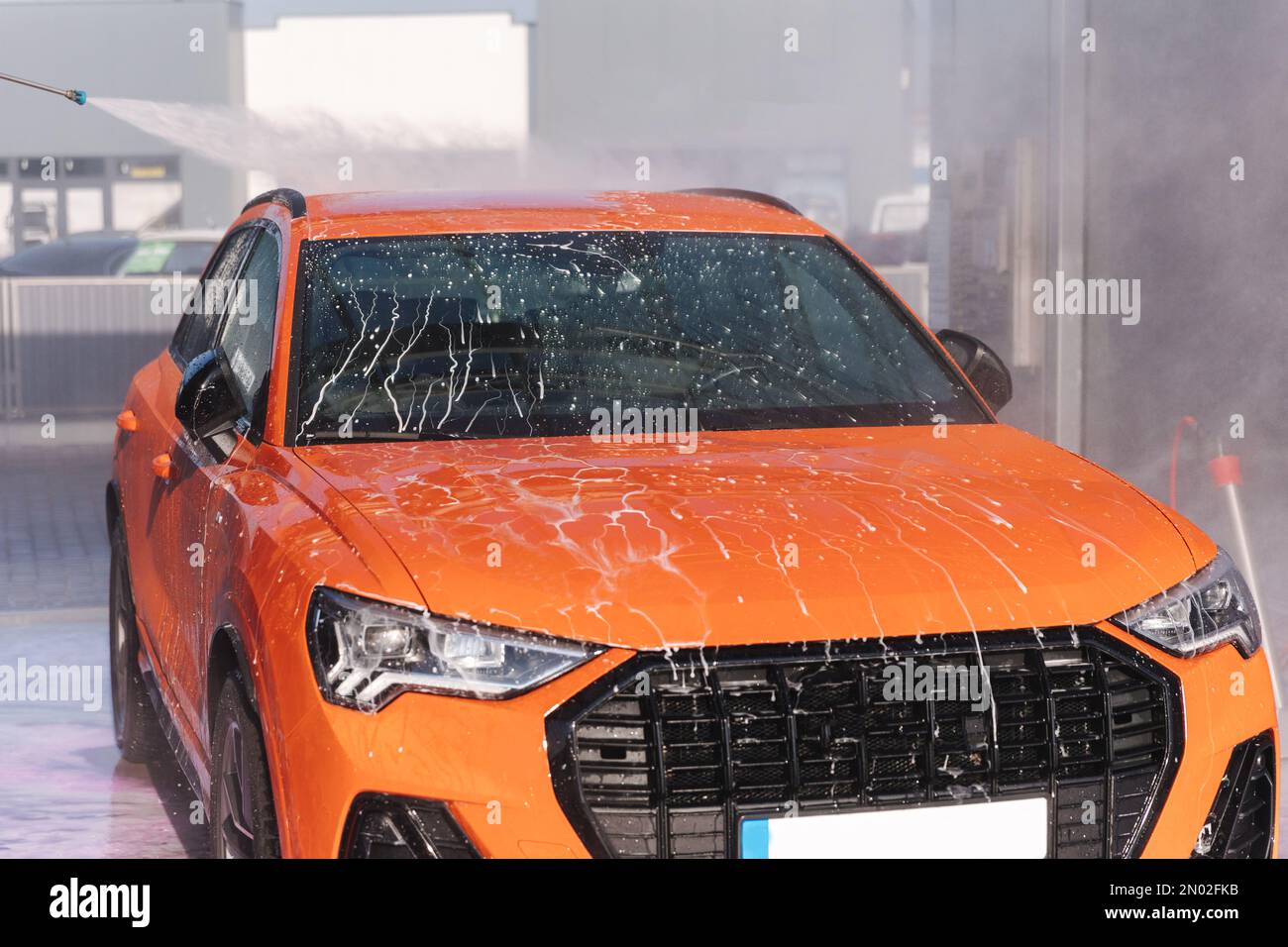 Process of cleaning car with a jet sprayer. Self service car washing ...