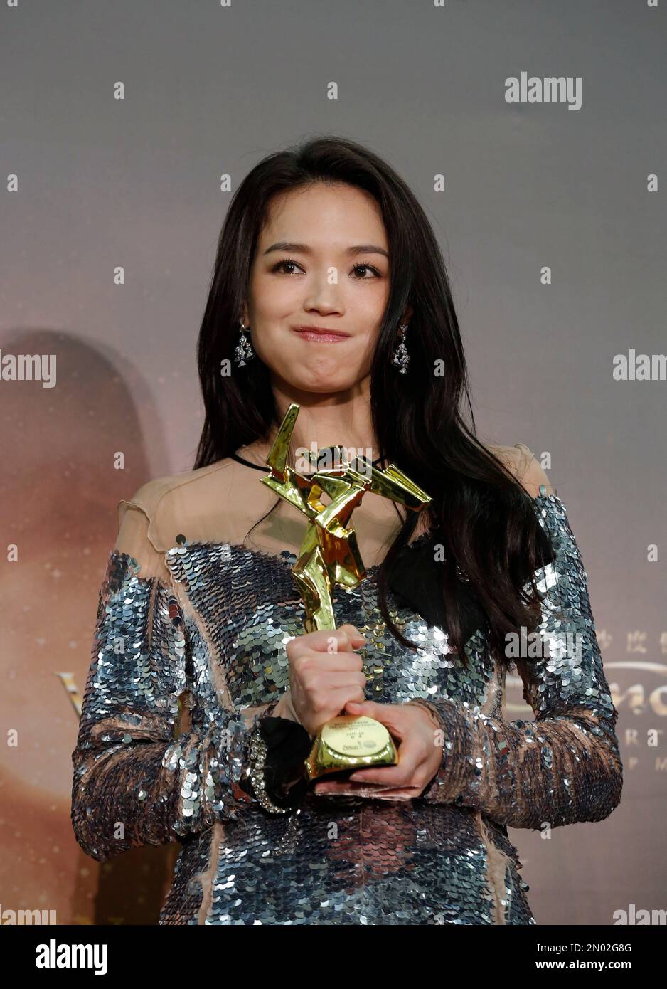 Taiwanese actress Shu Qi poses after winning the Best Actress awards of ...