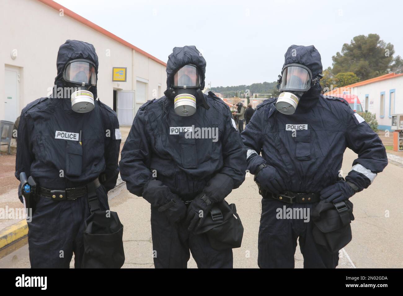 Police officers wear gas masks as they train for a chemical attack at ...