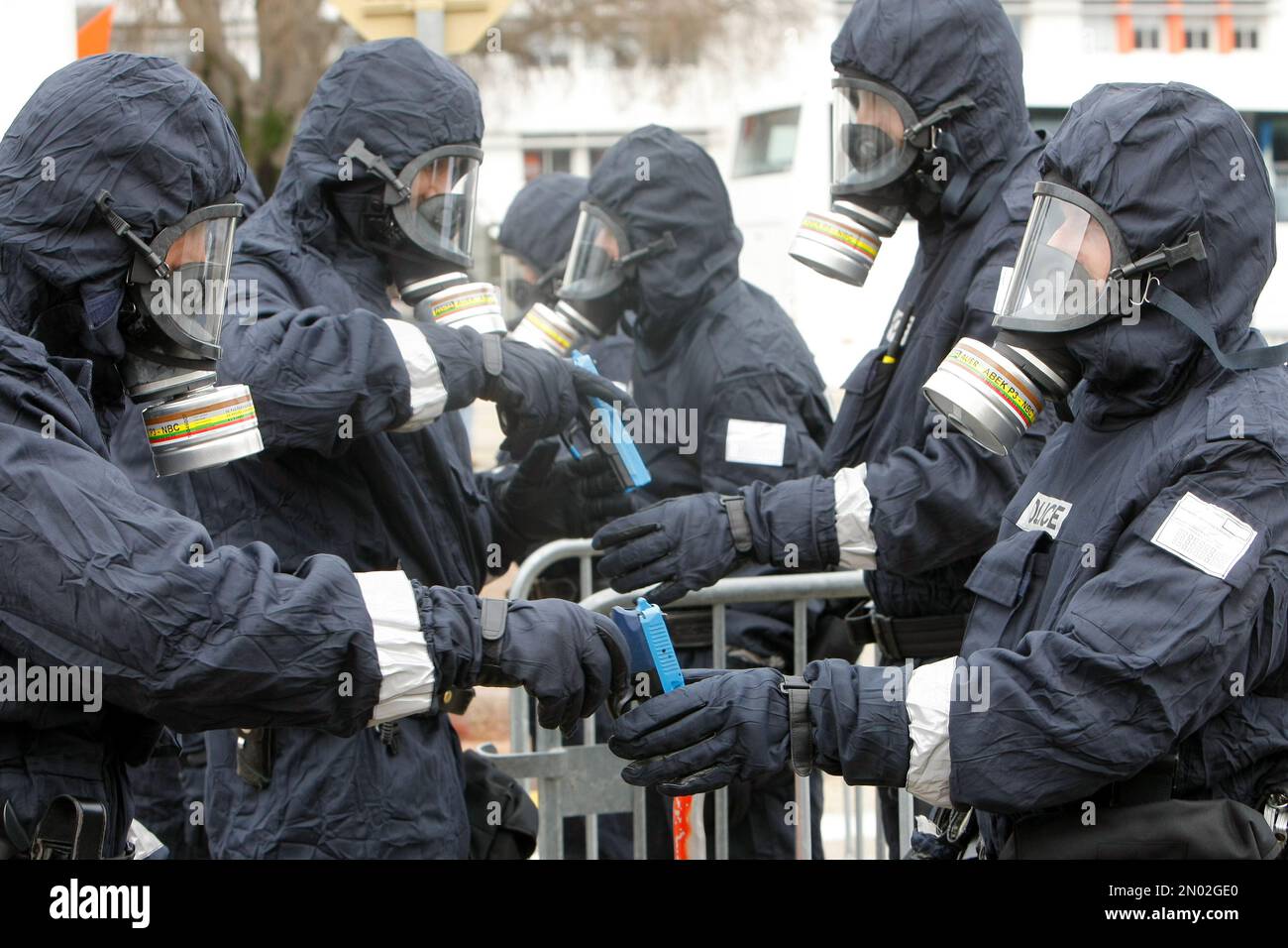 Police officers wear gas masks as they train for a chemical attack at ...