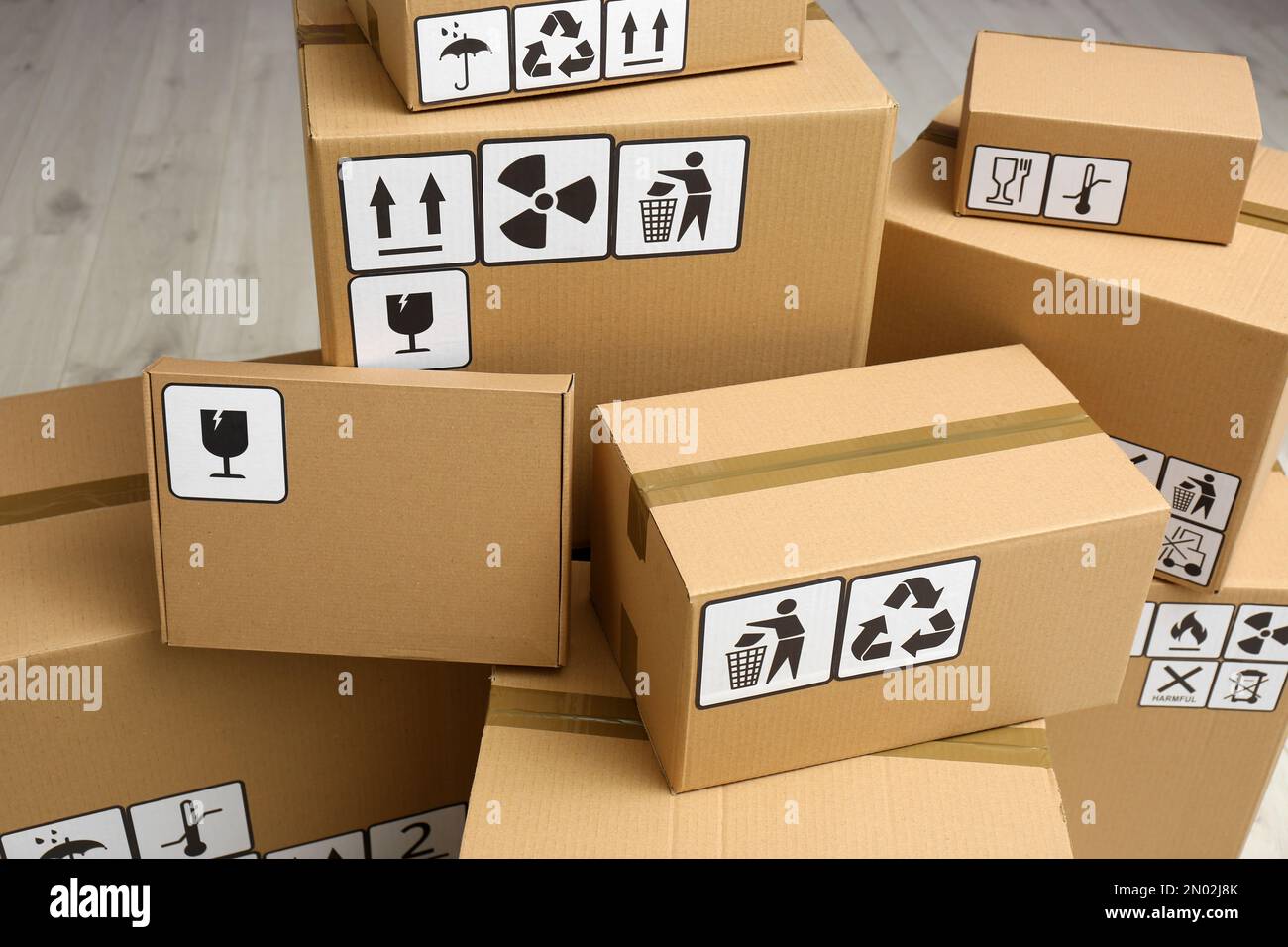 Cardboard boxes with different packaging symbols. Parcel delivery Stock ...