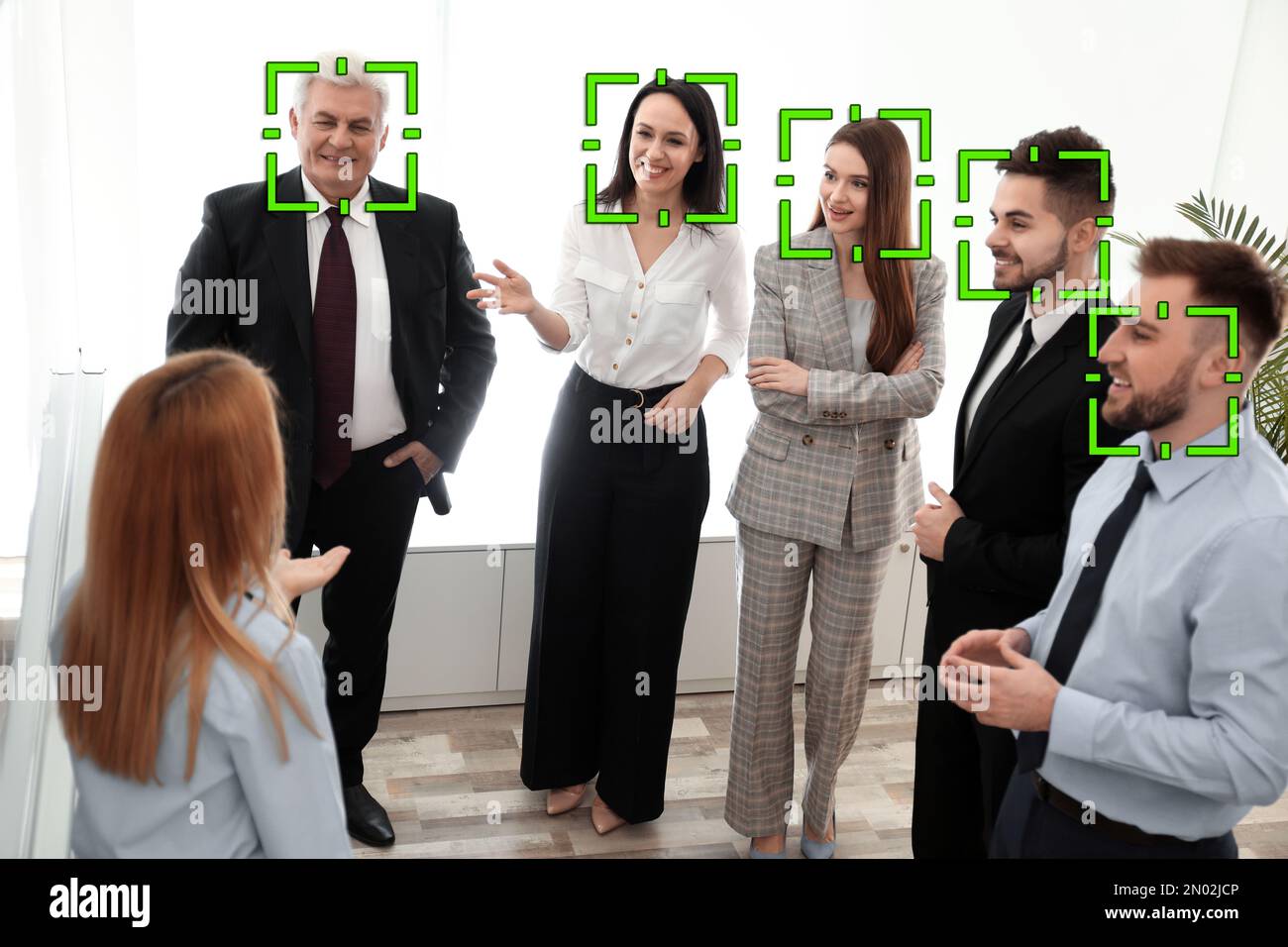 Facial recognition system identifying people at business meeting Stock ...