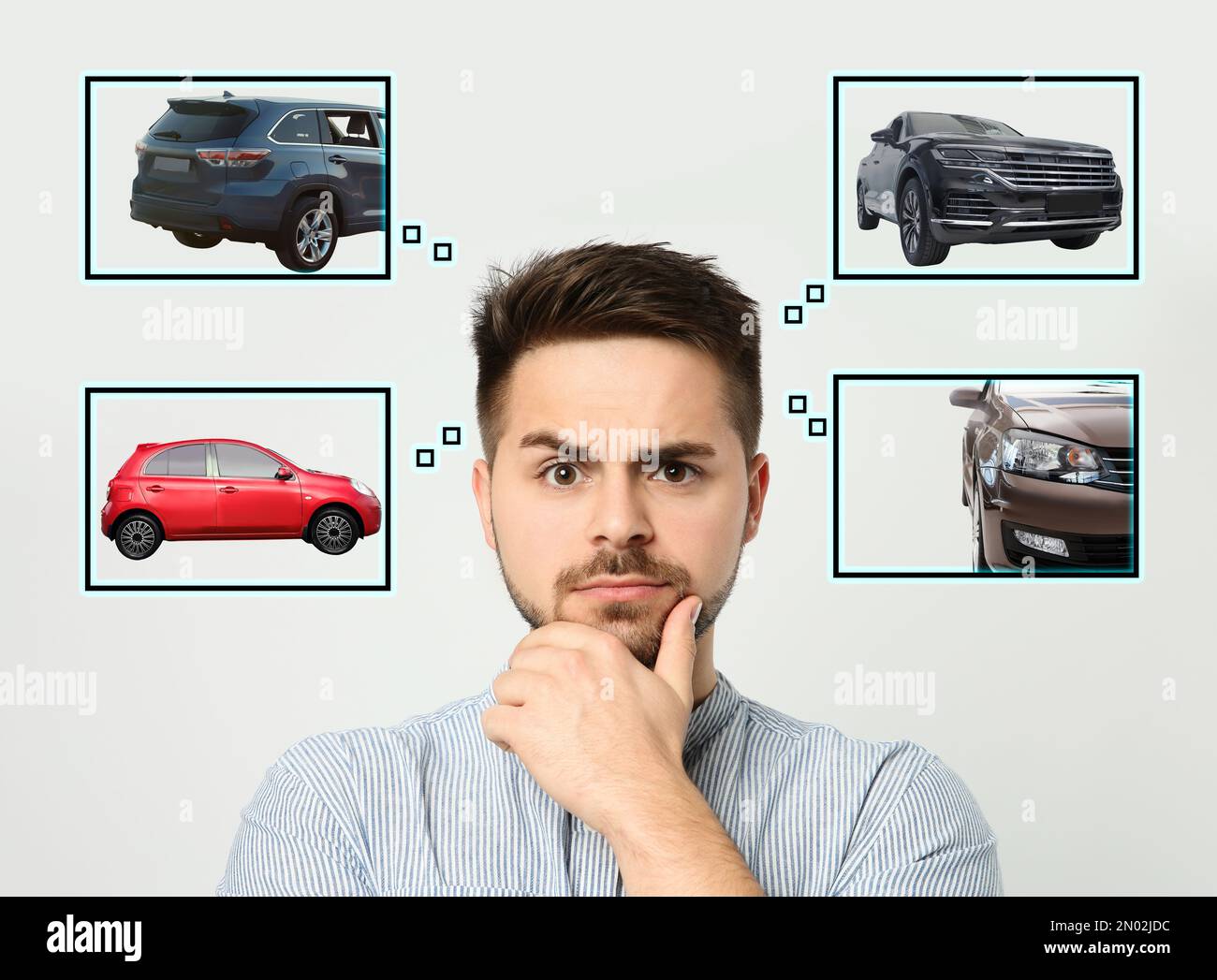 Car buying. Man choosing auto on light background Stock Photo - Alamy