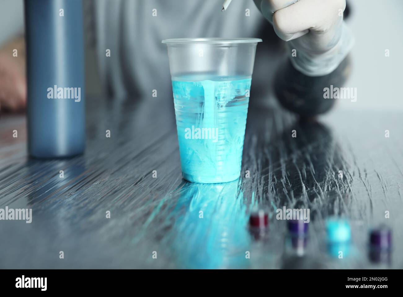 Tattoo artist cleaning machine hi-res stock photography and images - Alamy