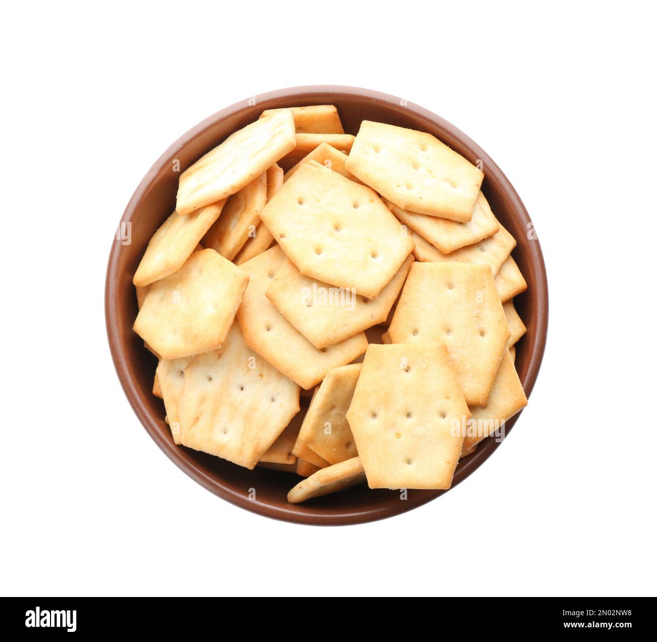 Delicious crackers in bowl isolated on white, top view Stock Photo - Alamy