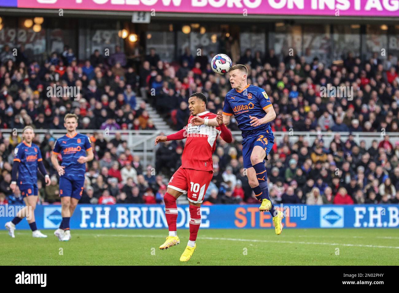 Andy Lyons #24 of Blackpool wins the high-ball during the Sky Bet ...