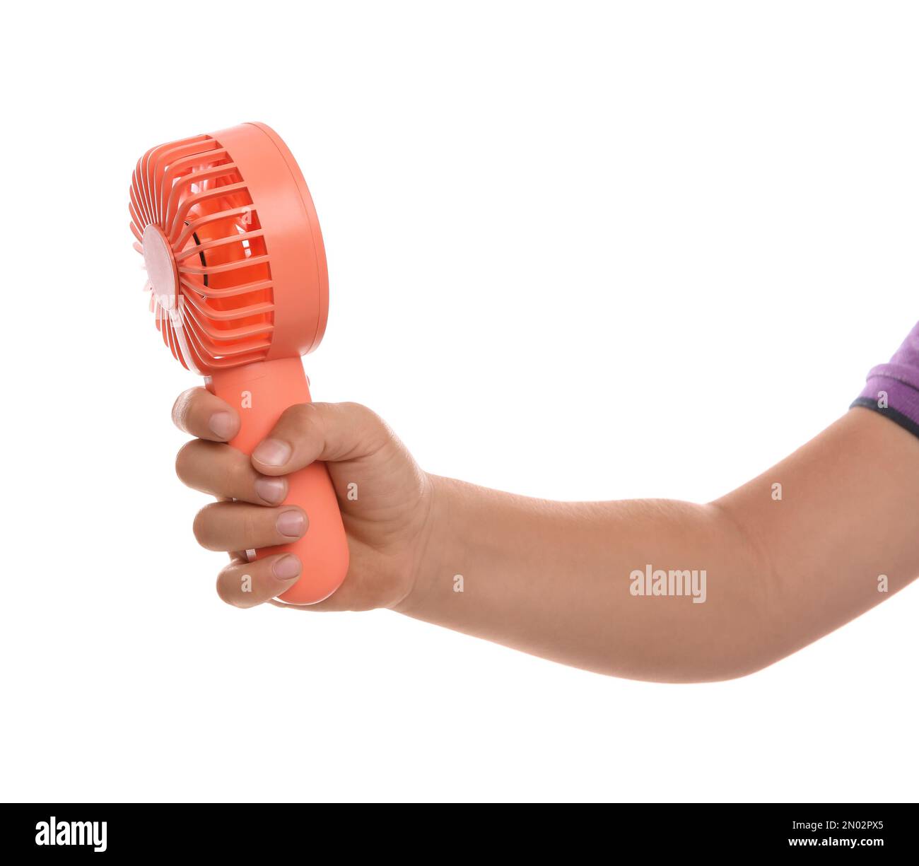 Little boy with portable fan on white background, closeup. Summer heat ...