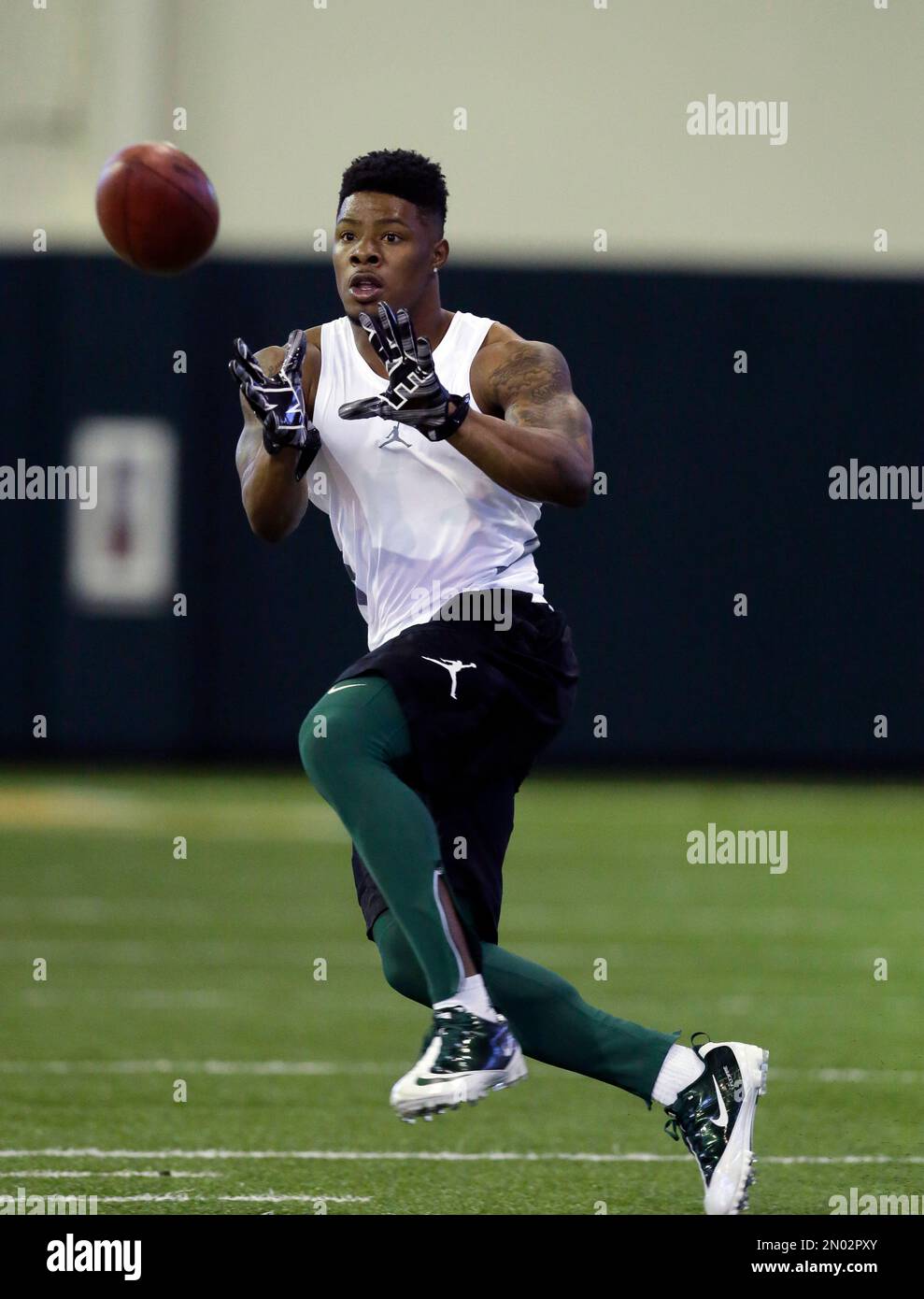 Wide receiver Corey Coleman catches a pass for NFL scouts during the ...