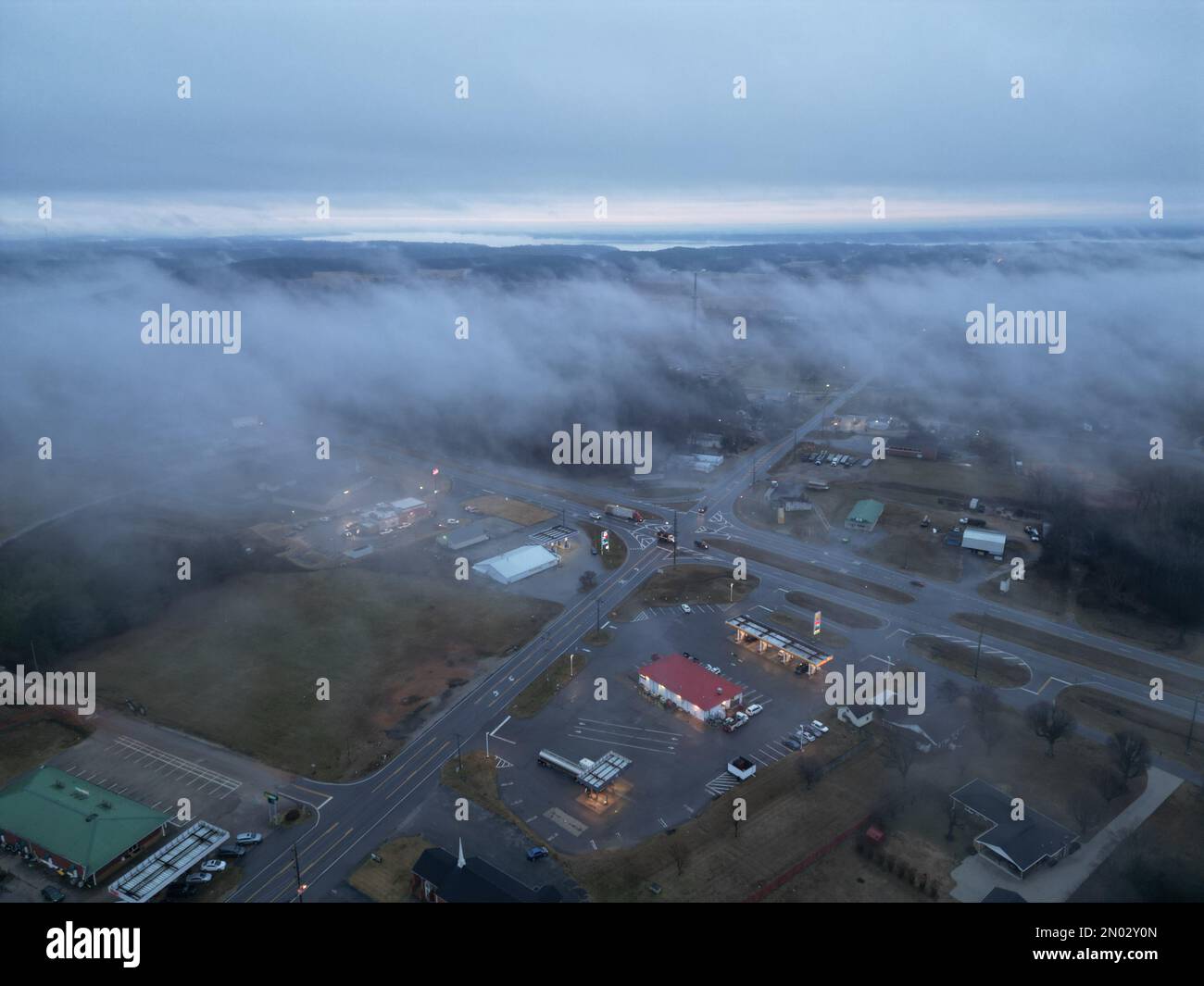 An aerial view of a town covered in fog Stock Photo - Alamy