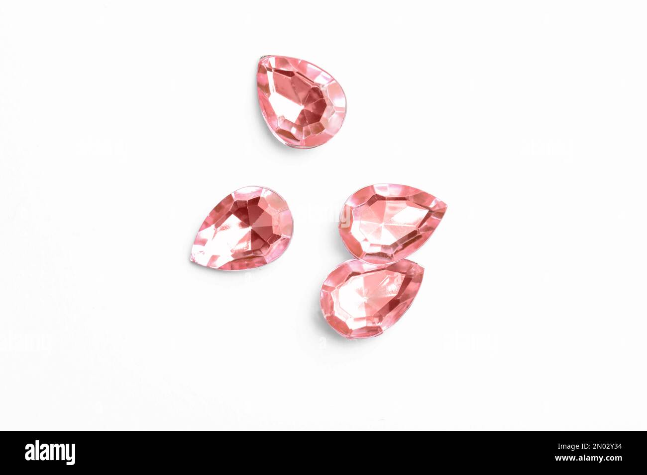 Beautiful gemstones on white background, top view Stock Photo - Alamy
