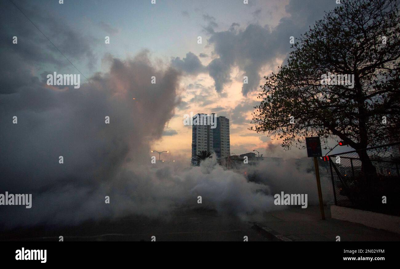 Fumigation fog fills the Vedado neighborhood after soldiers sprayed to ...