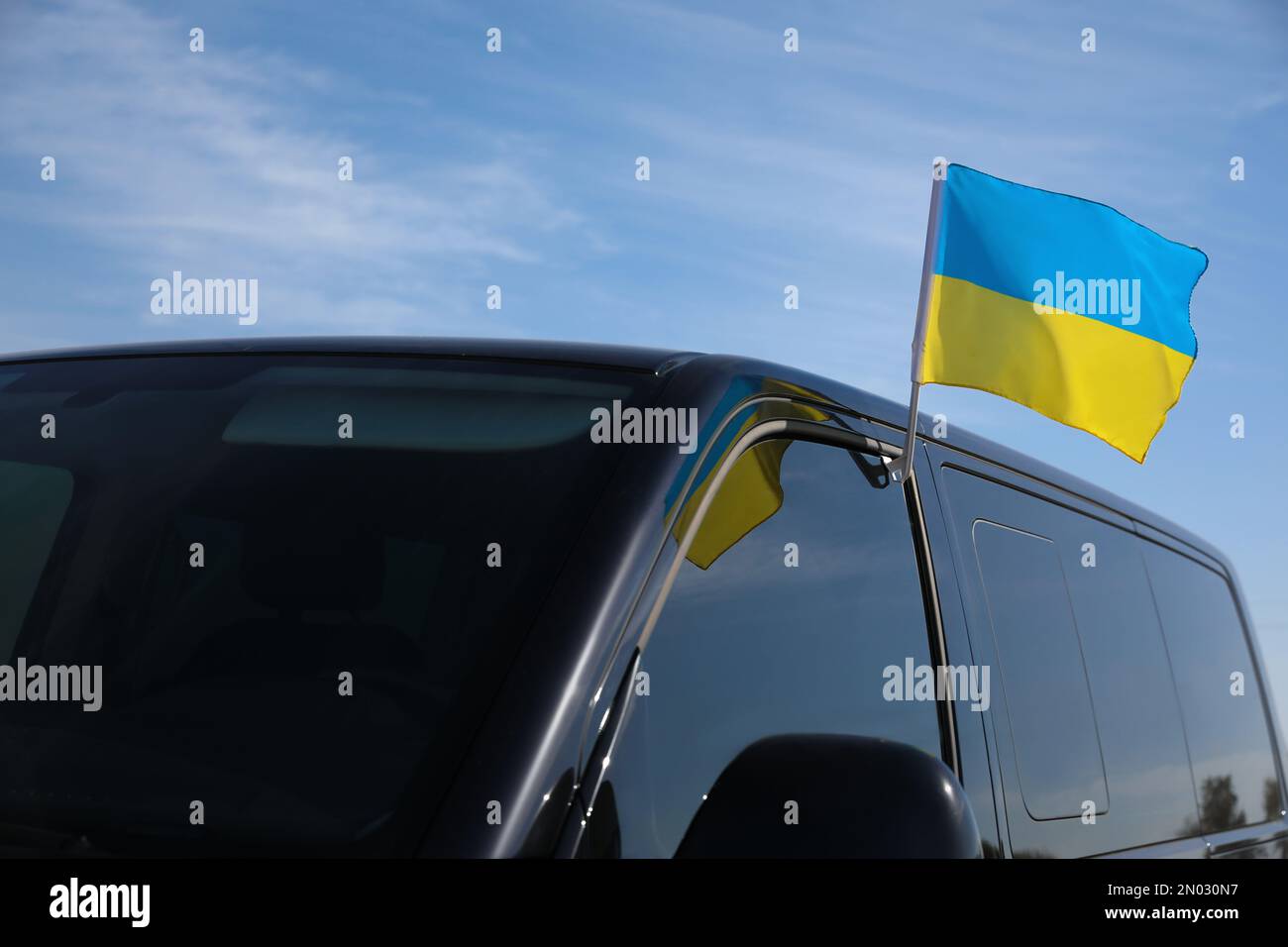 National flag of Ukraine on car window outdoors Stock Photo - Alamy