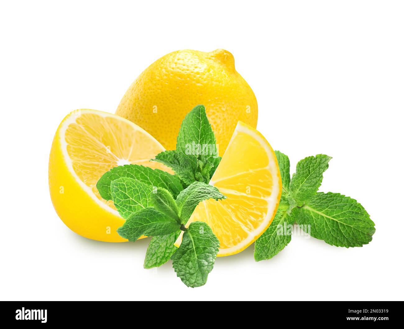 Fresh lemons and green mint leaves on white background Stock Photo - Alamy