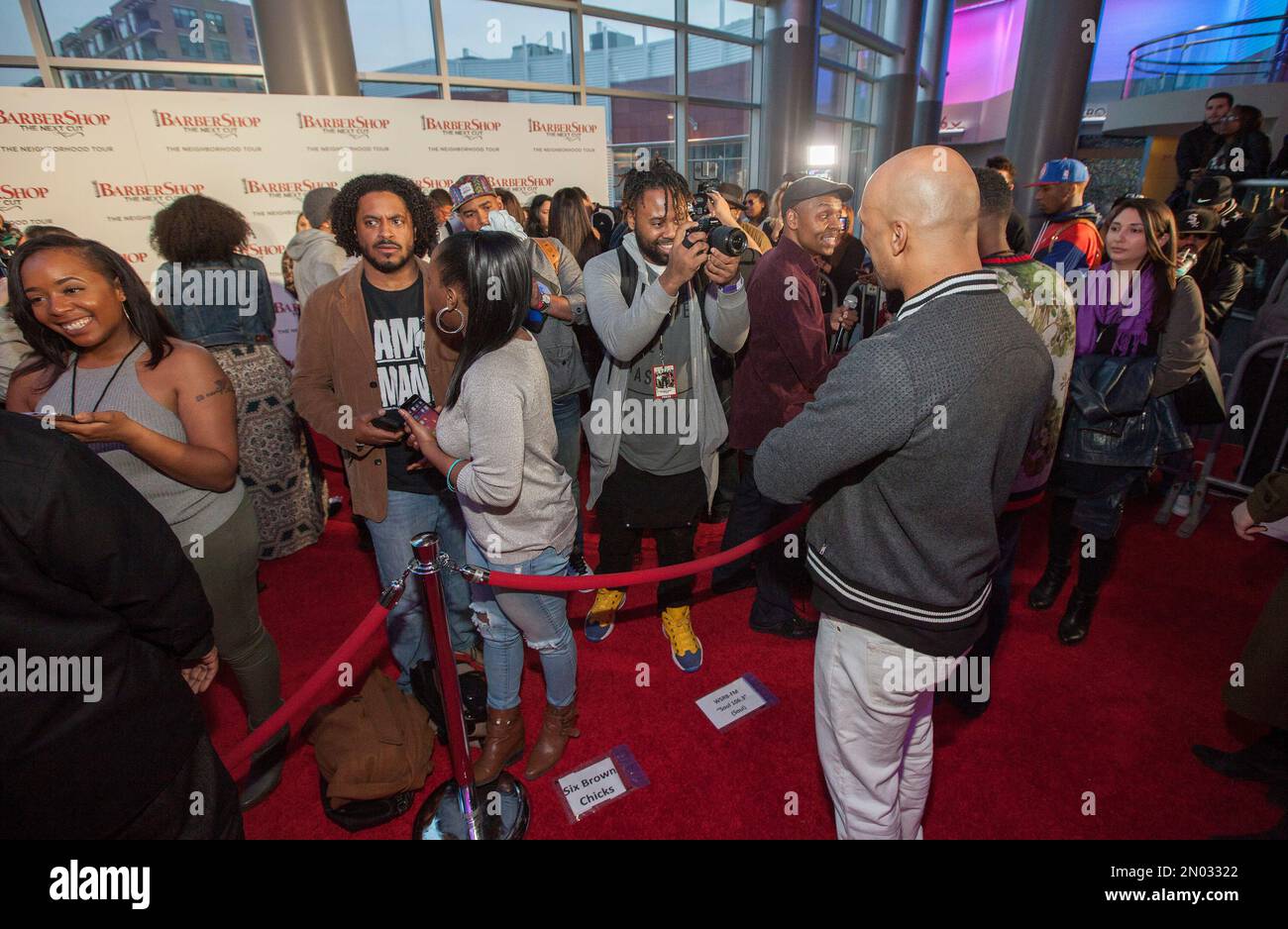 On right, actor Common at the Chicago premiere of Barbershop: The Next ...
