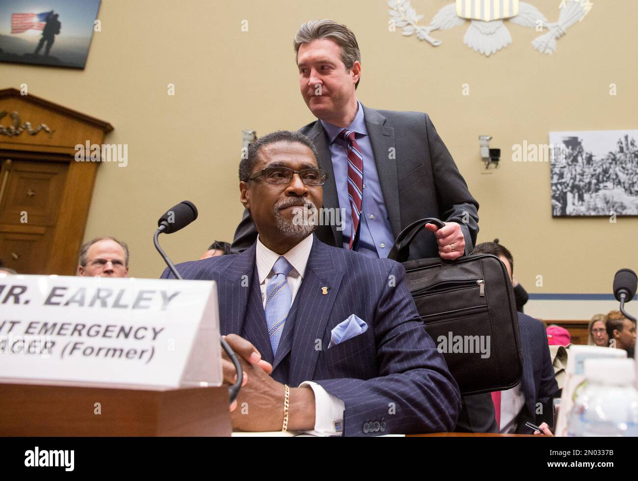 Former Flint, Mich., Emergency Manager Darnell Earley, left, and former ...